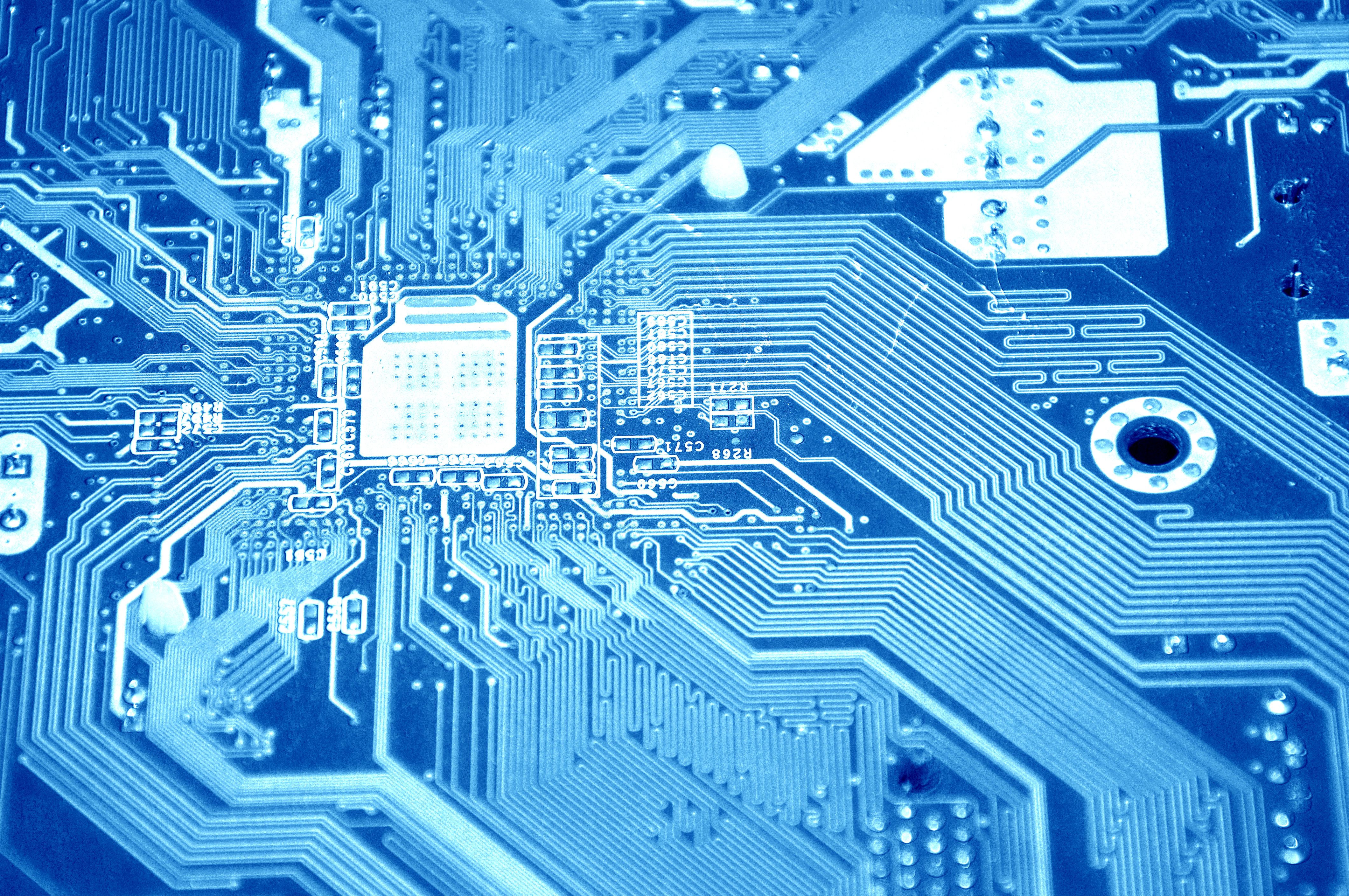 Computer technology concept. Blue background.